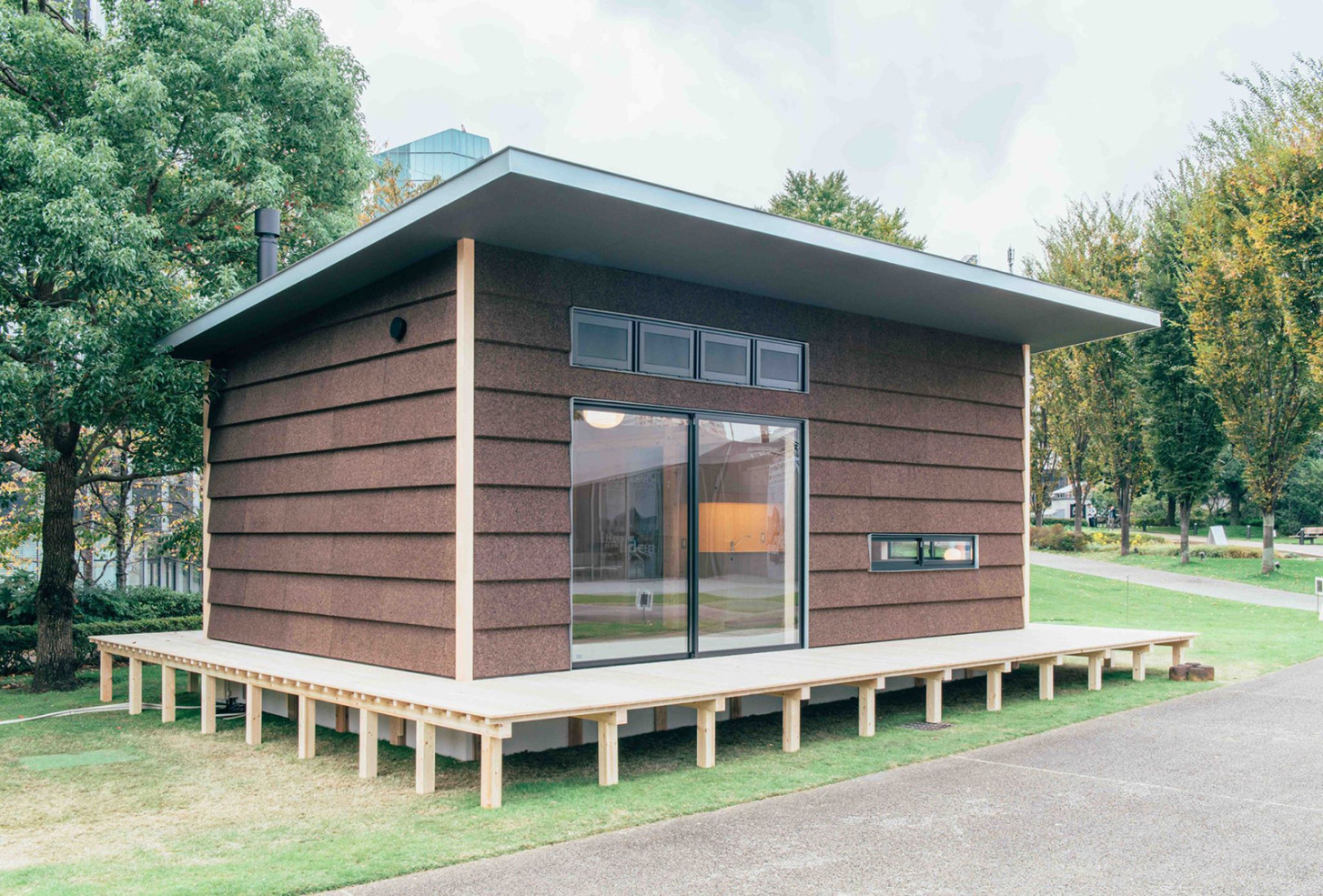 Muji unveils prefab huts designed by Morrison, Grcic and Fukasawa