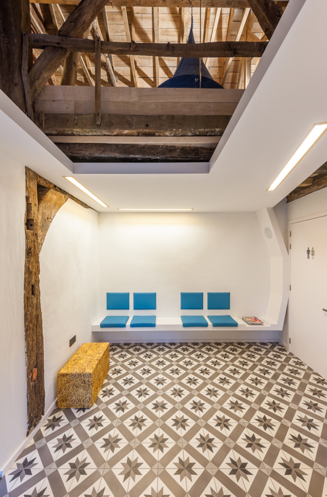 A 420-year-old farmhouse morphs into a medical practice in Belgium ...