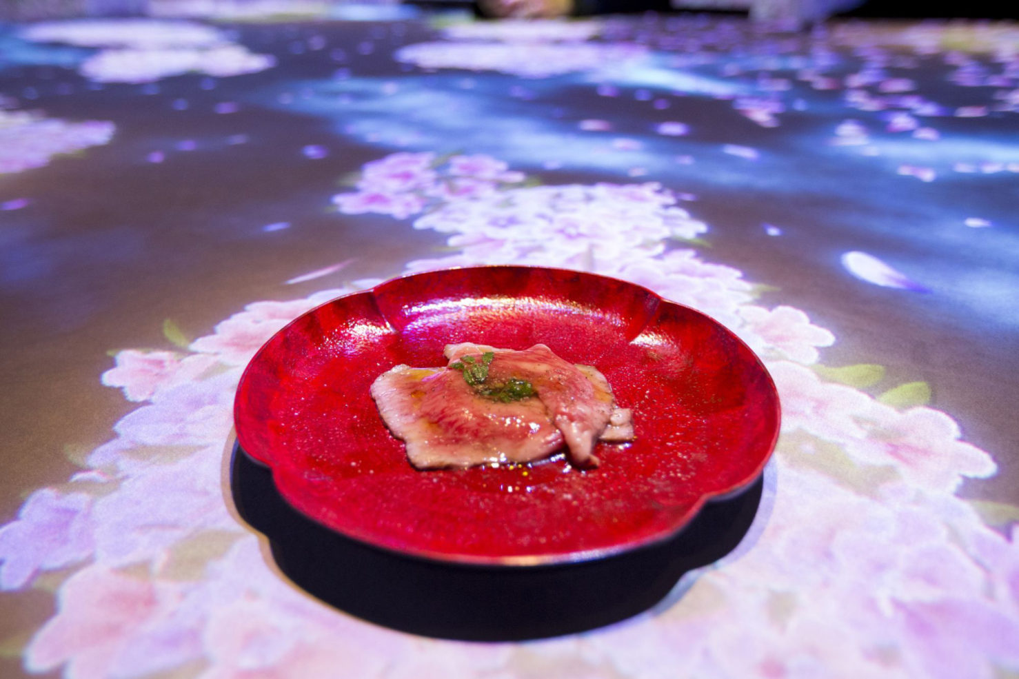 Plates spring to life in teamLab’s new Tokyo restaurant installation